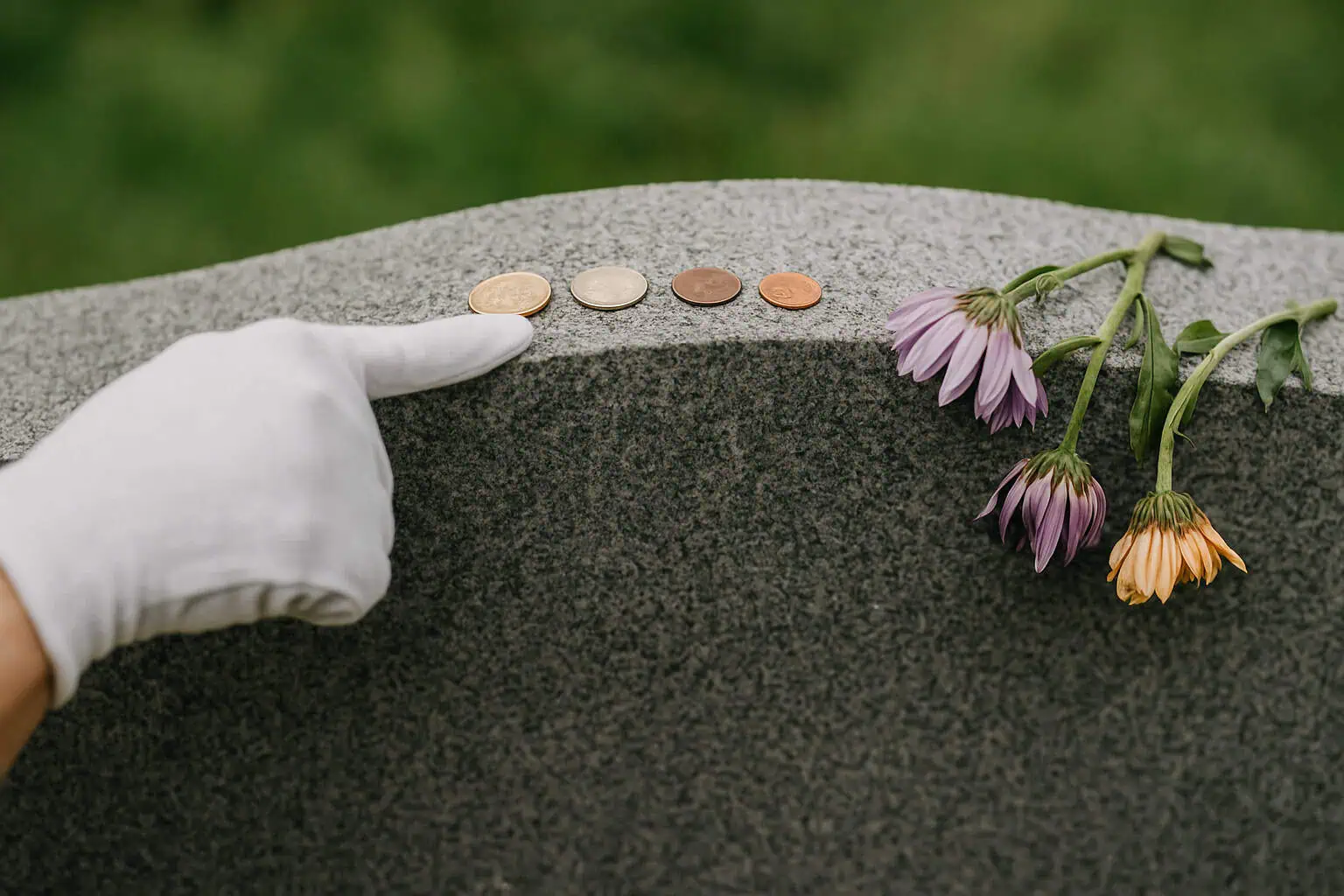 The 5 Secret Reasons People Put Coins On Headstones